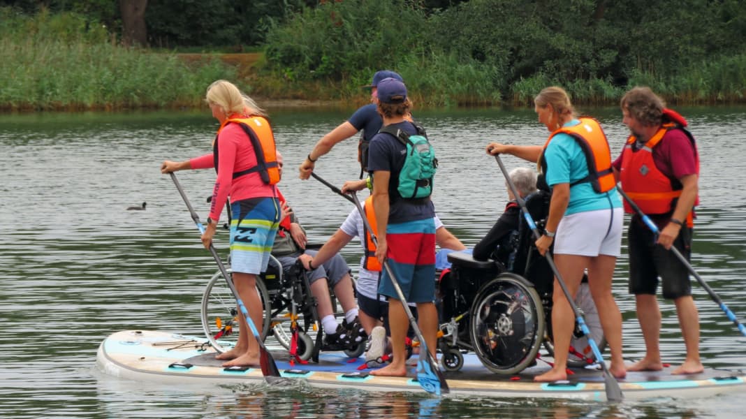 Let's SUP together: paddling fun for people with disabilities | SURF